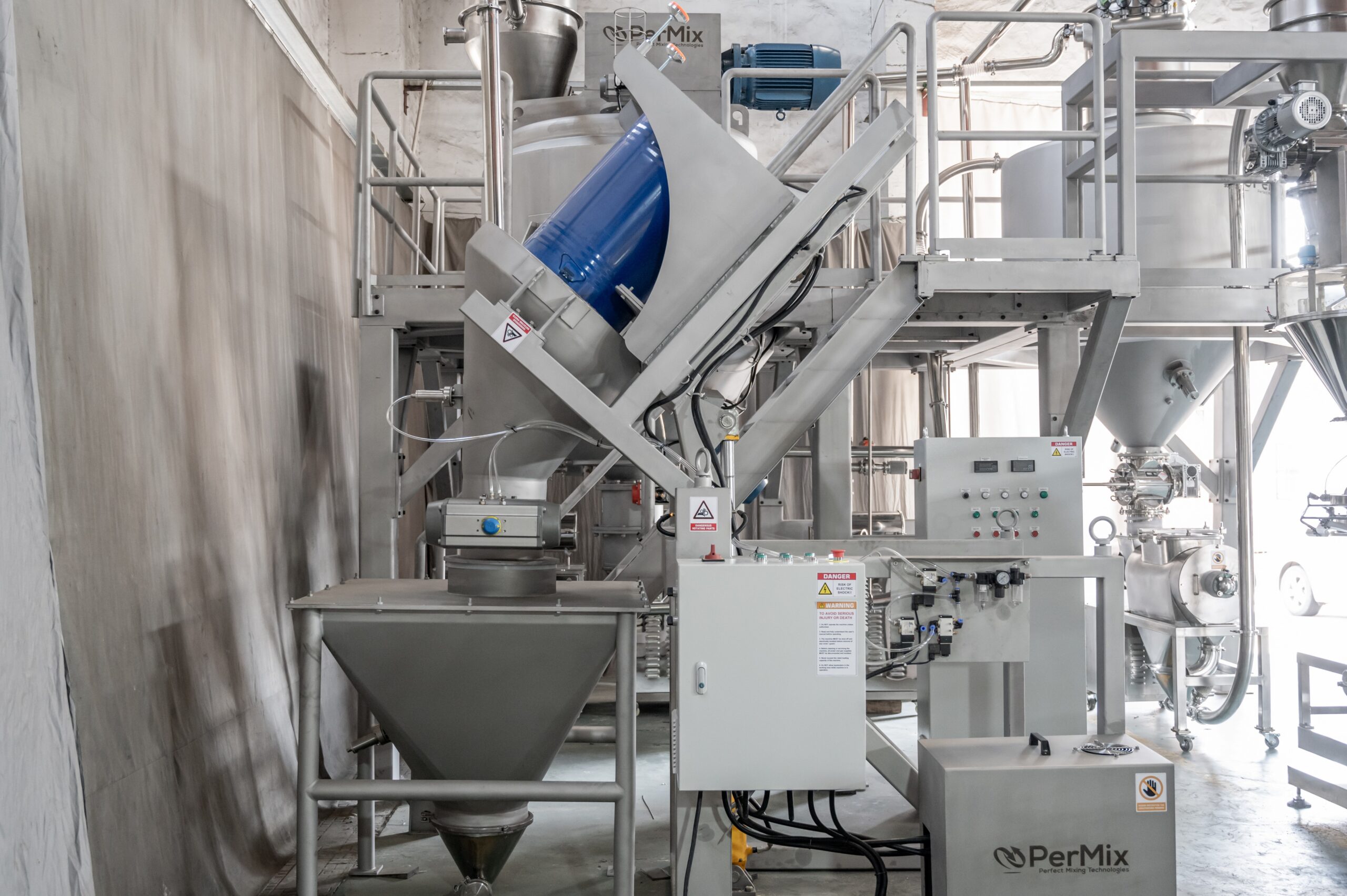 Drum Lifters/Loaders Speeds Up Loading Of Industrial Mixers