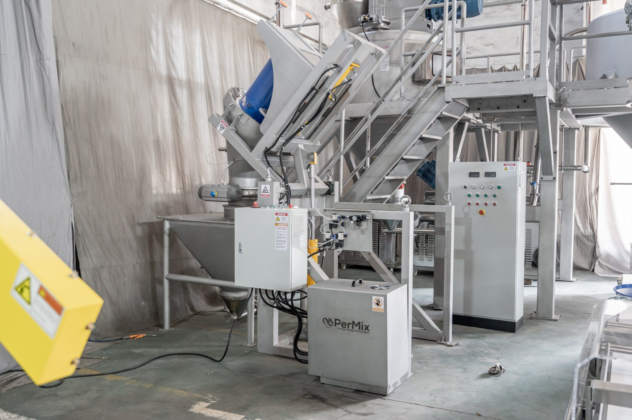 Drum Lifters/Loaders Speeds Up Loading Of Industrial Mixers