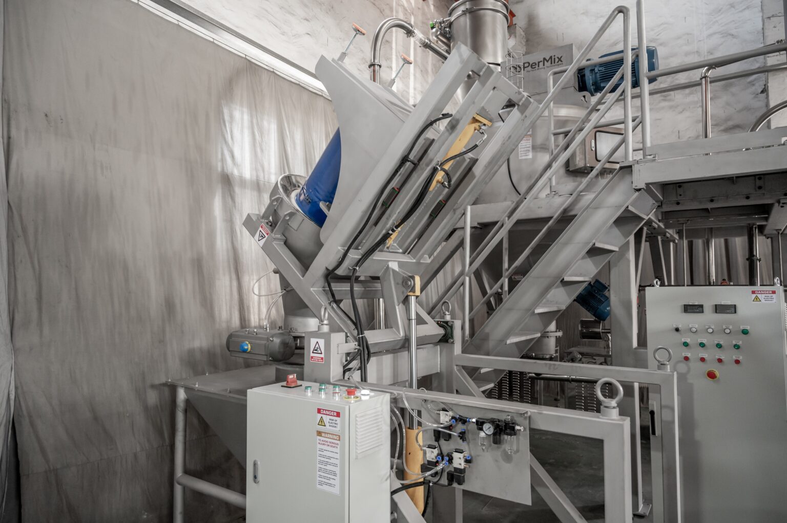 Drum Lifters/Loaders Speeds Up Loading Of Industrial Mixers