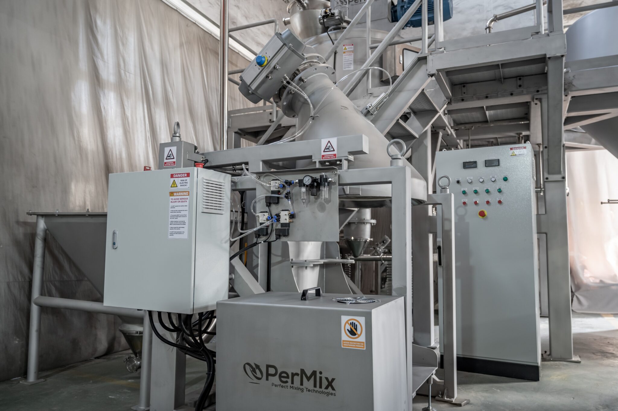 Drum Lifters/Loaders Speeds Up Loading Of Industrial Mixers
