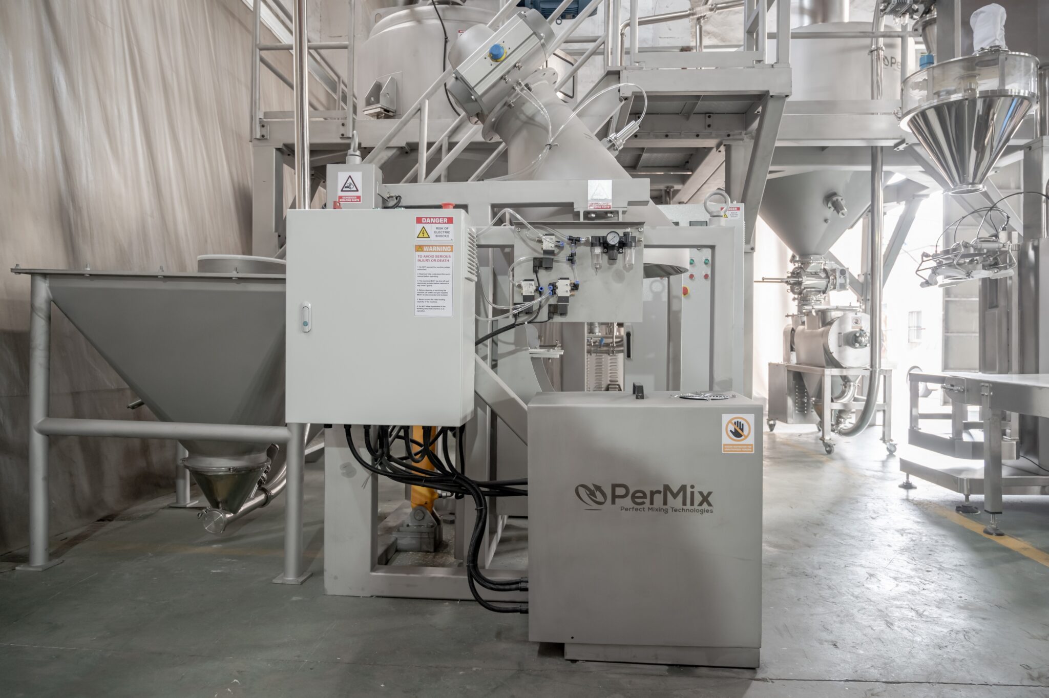 Drum Lifters/Loaders Speeds Up Loading Of Industrial Mixers